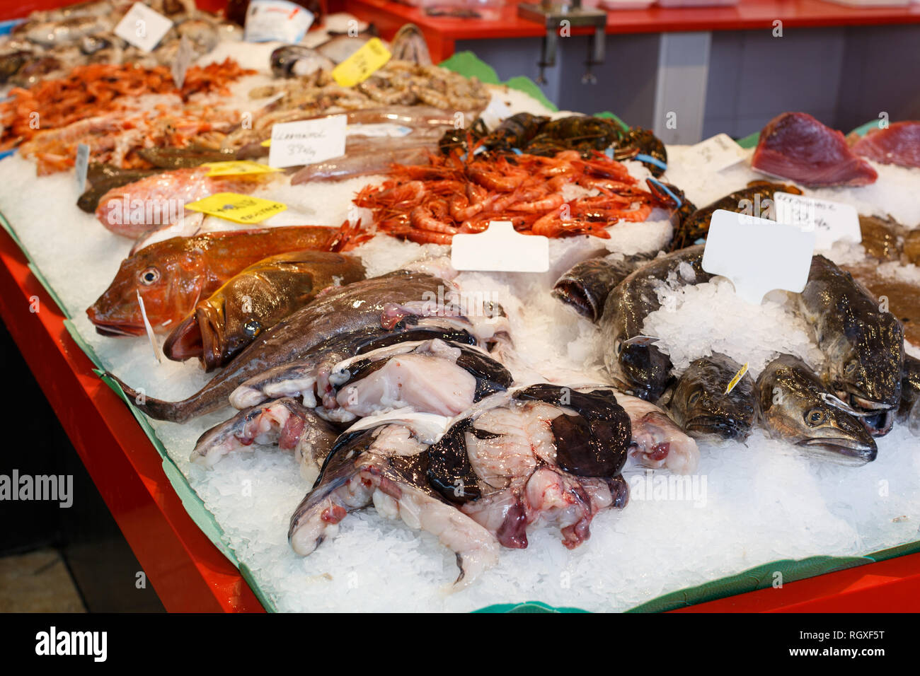 Open display with assorted seafood at fish market Stock Photo - Alamy