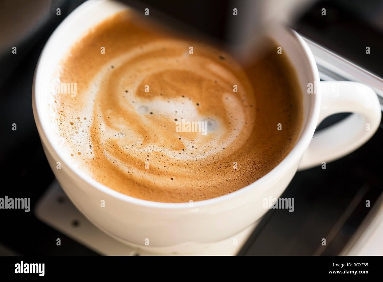 Cup of cappuccino closeup with creamy soft milk froth, top view on ...