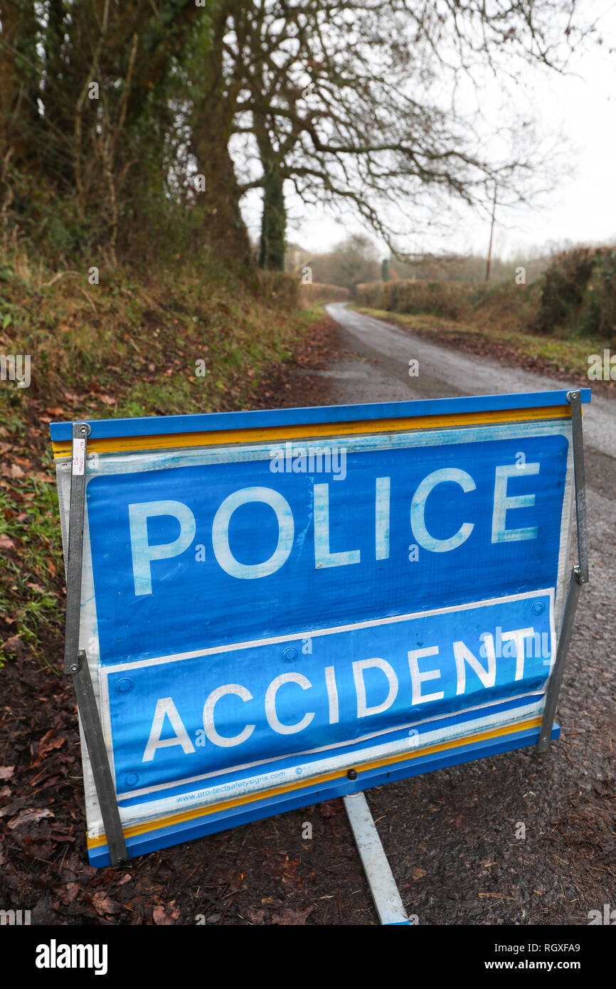 Police accident road sign on a country lane at the scene of an accident ...