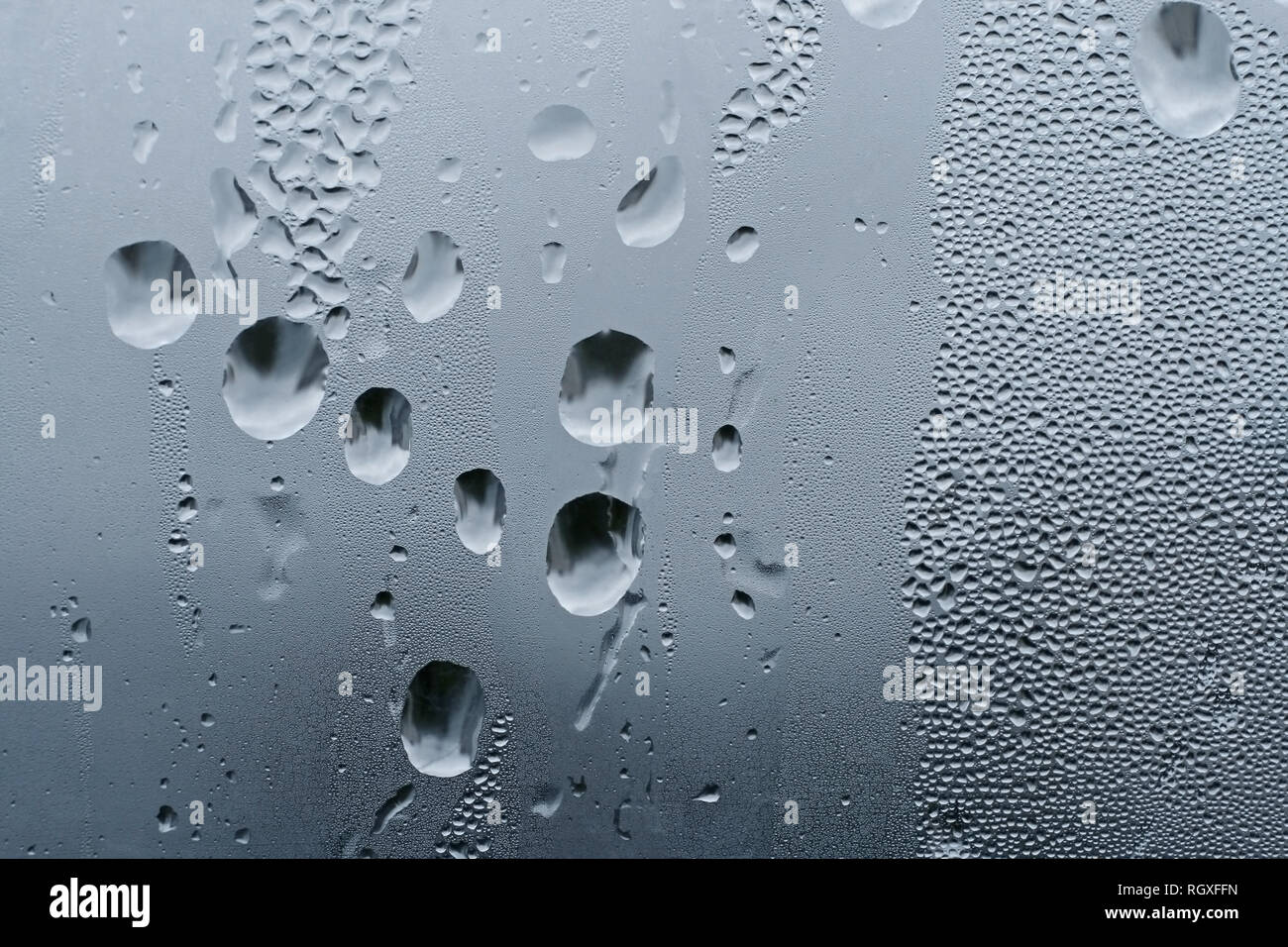 Large and fine water drops on glass Stock Photo - Alamy