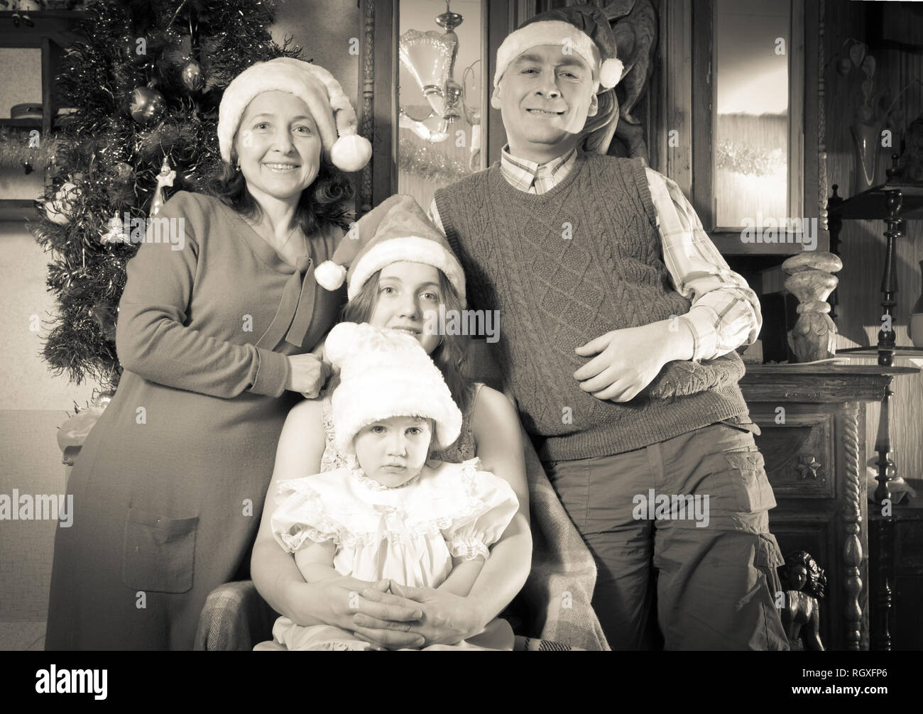 old photo of happy family of three generations posing for Christmas ...
