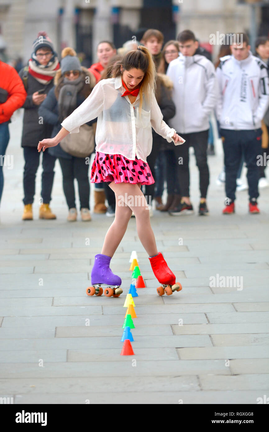 London, England, UK. Street performer rollerskating in Trafalgar Square ...