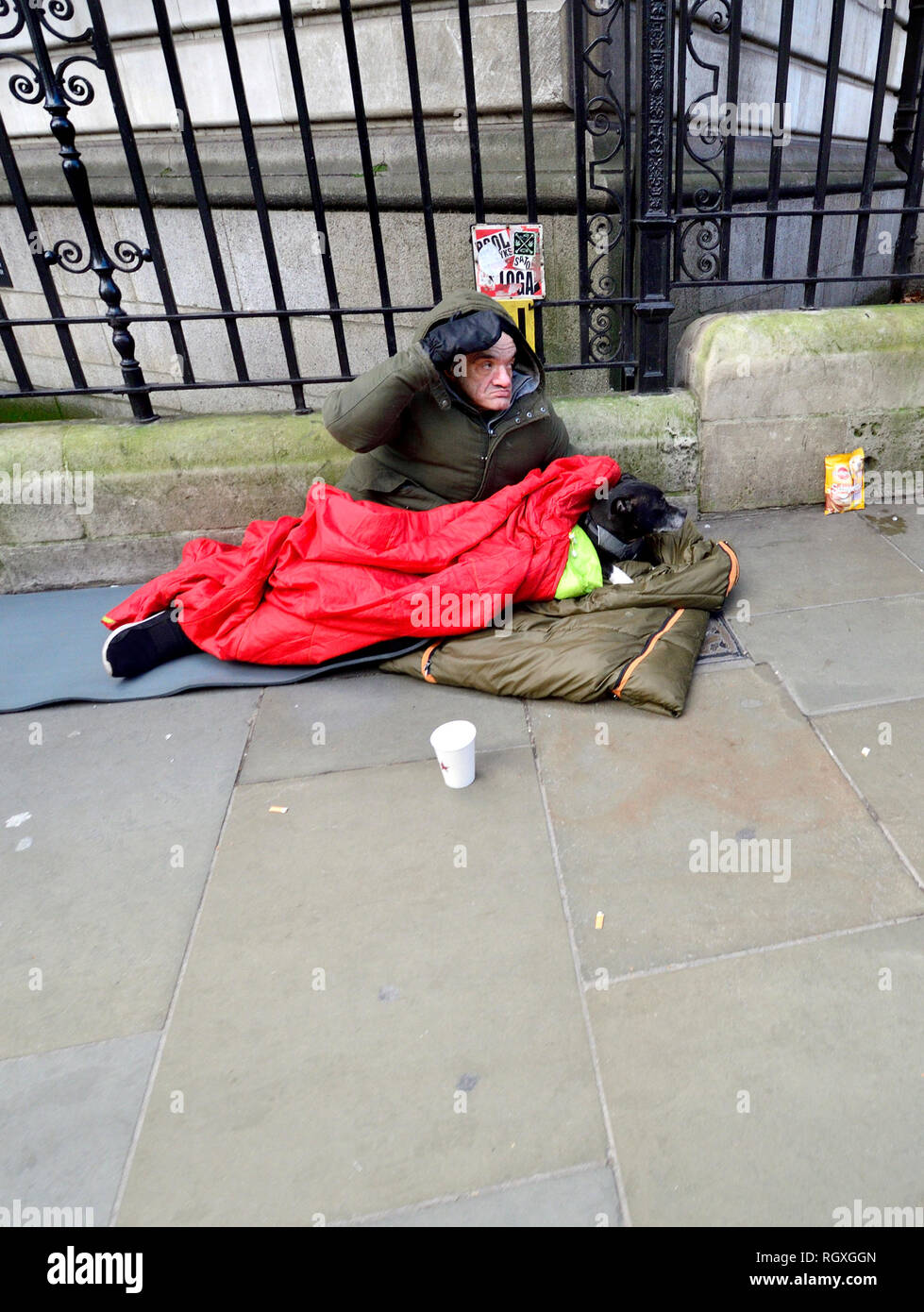 Homeless man with pet dog hi-res stock photography and images - Alamy