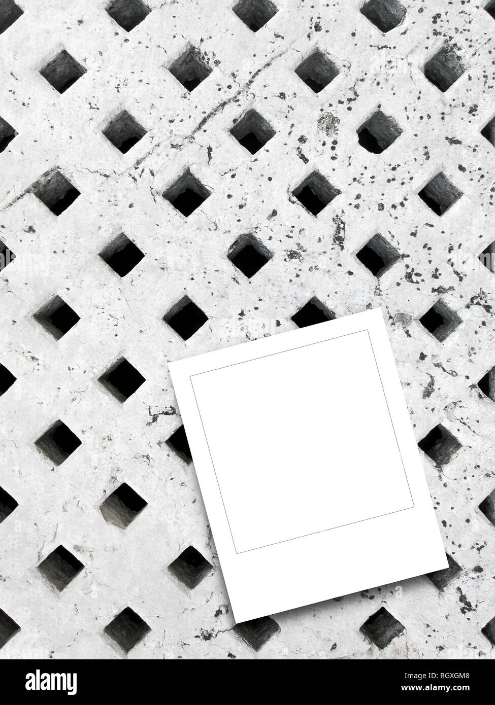 Blank square instant photo frame on white marble stone grid background ...