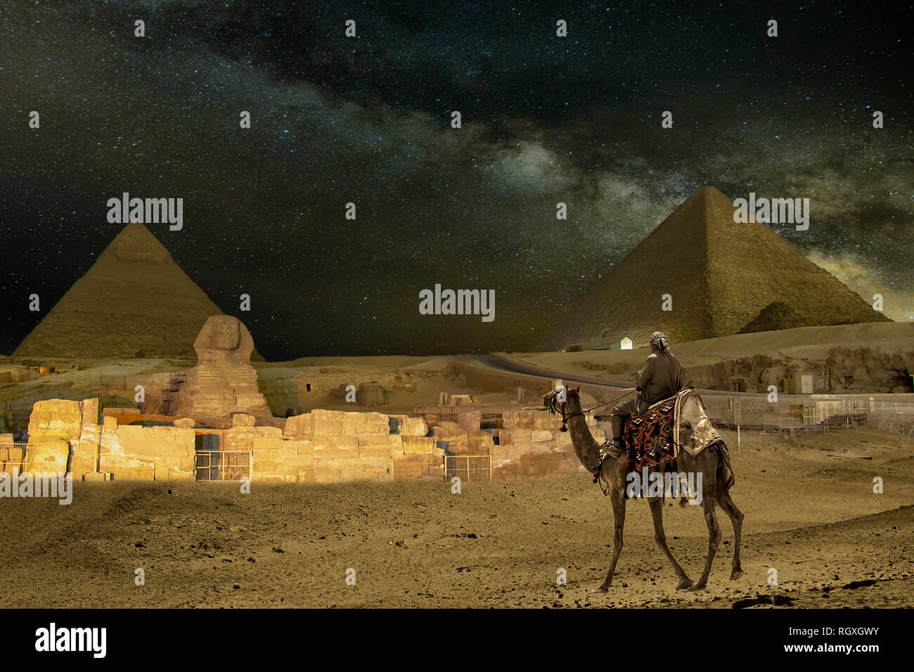 Giza pyramids and Sphinx light up at night Stock Photo - Alamy