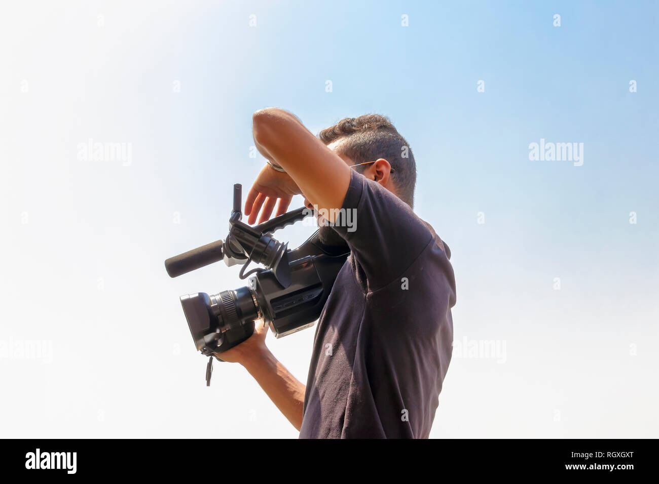 Egyptian Cameraman at work in a tourist cruise in Nile river Stock ...