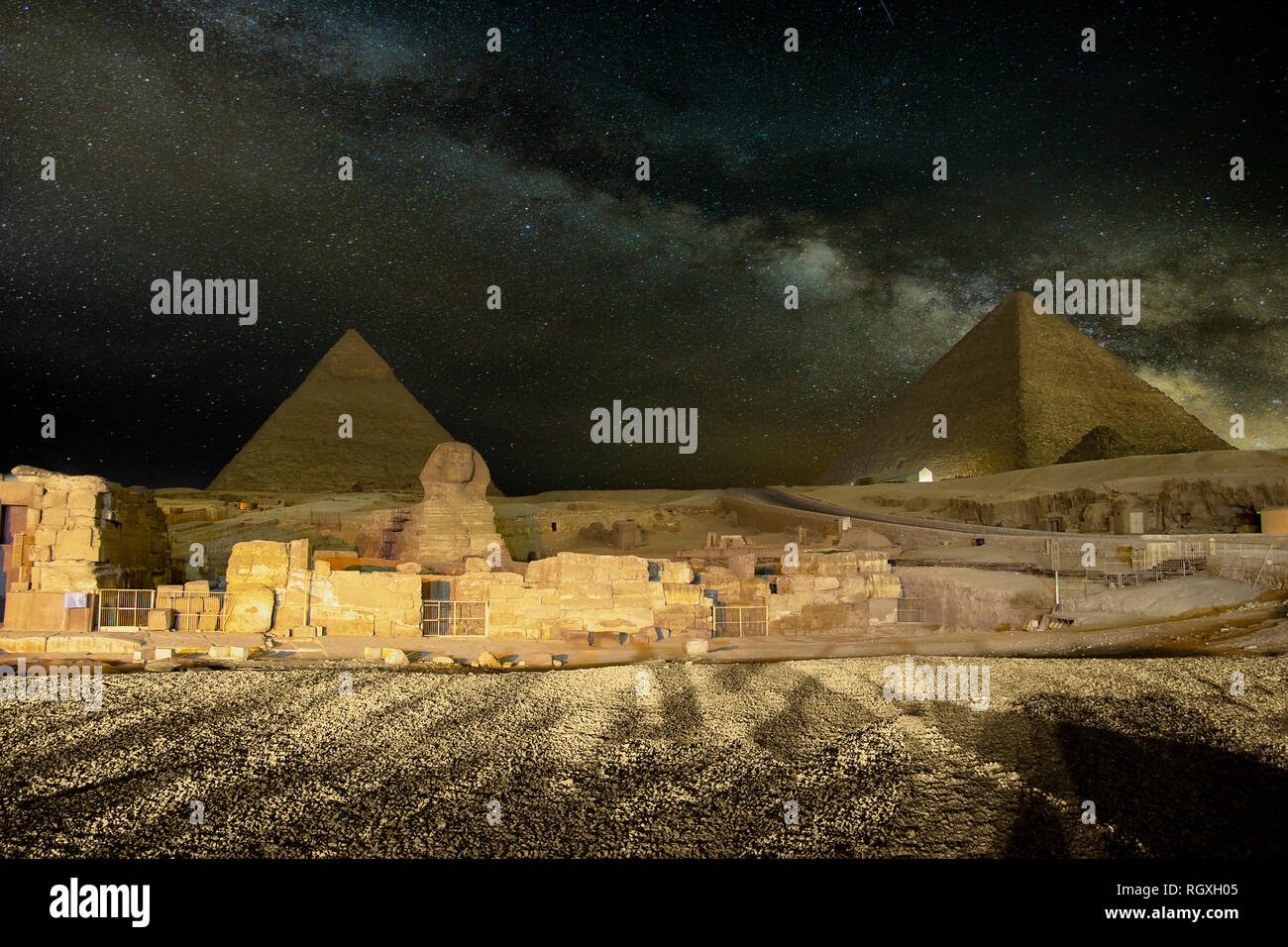 Giza pyramids and Sphinx light up at night Stock Photo - Alamy