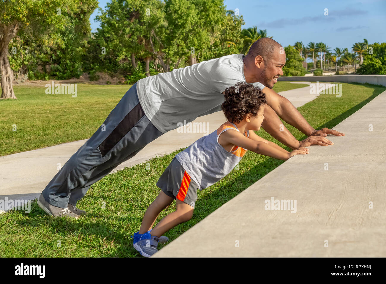 Father son sport push hi-res stock photography and images - Alamy