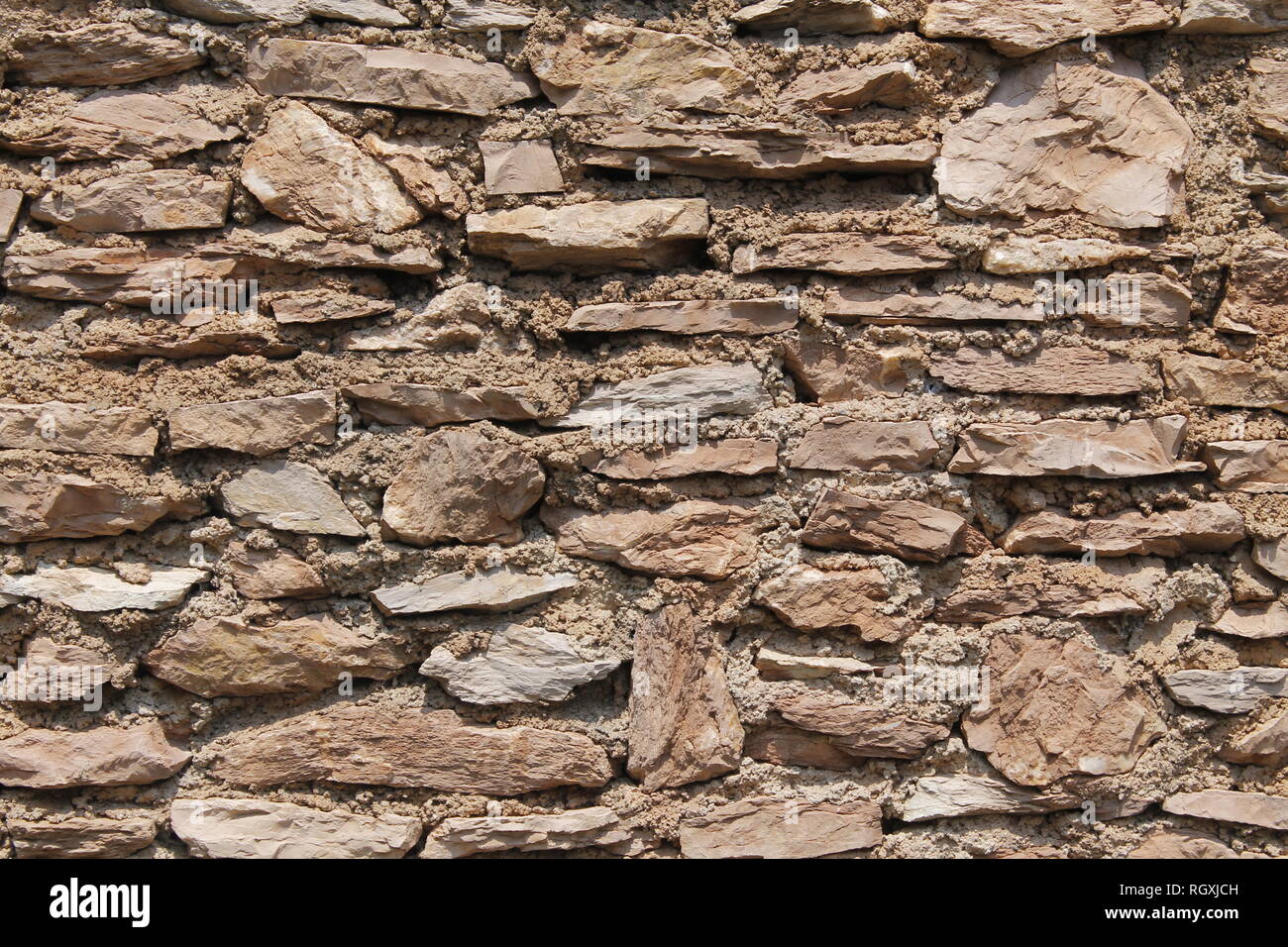 ancient wall with stone bricks. Old building material concept Stock ...