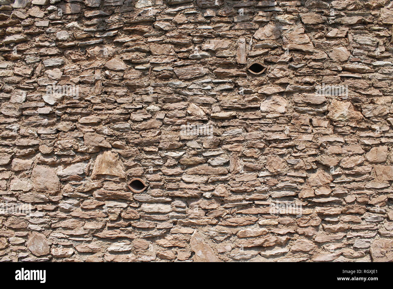 ancient wall with stone bricks. Old building material concept Stock ...