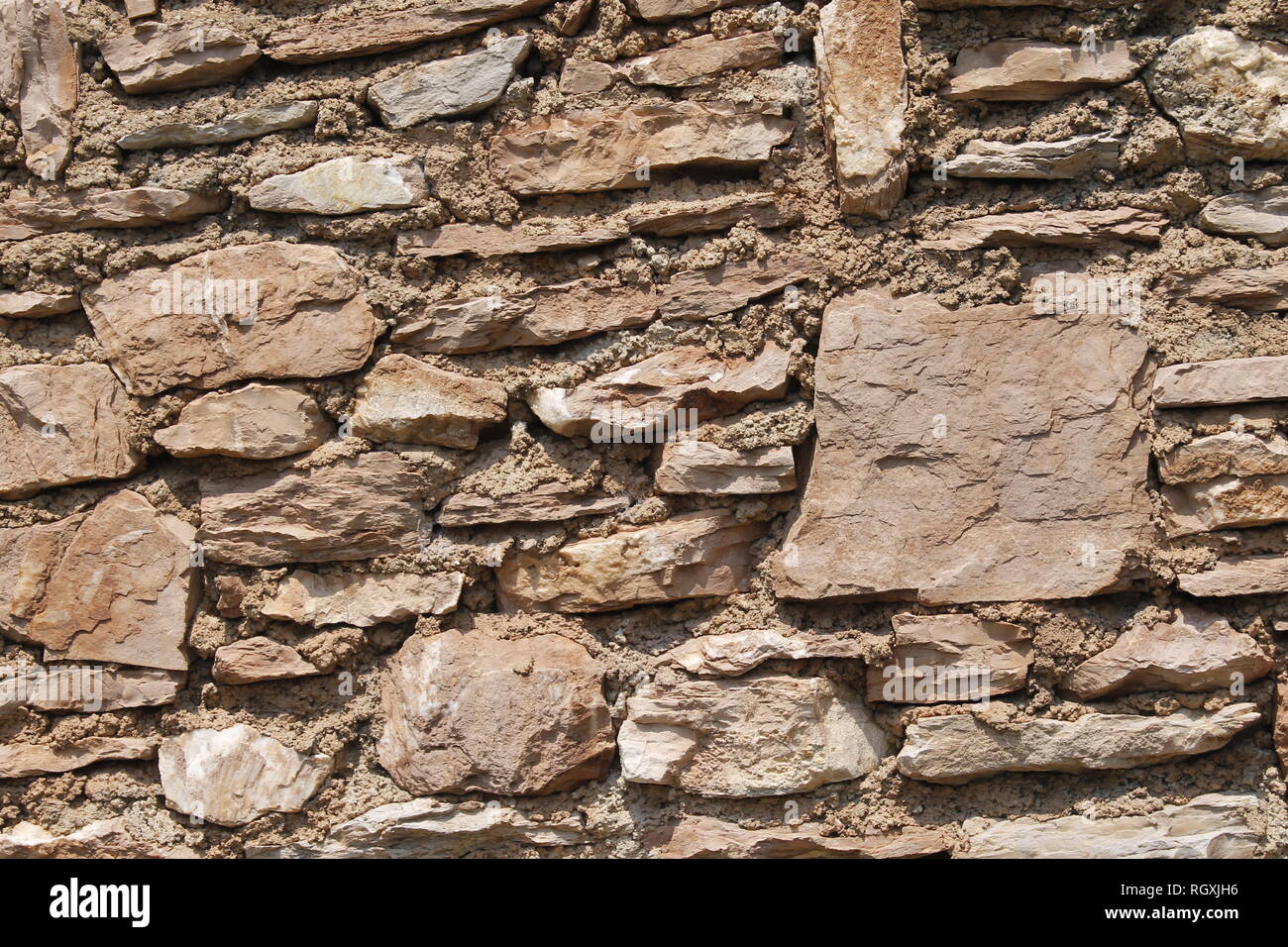ancient wall with stone bricks. Old building material concept Stock ...