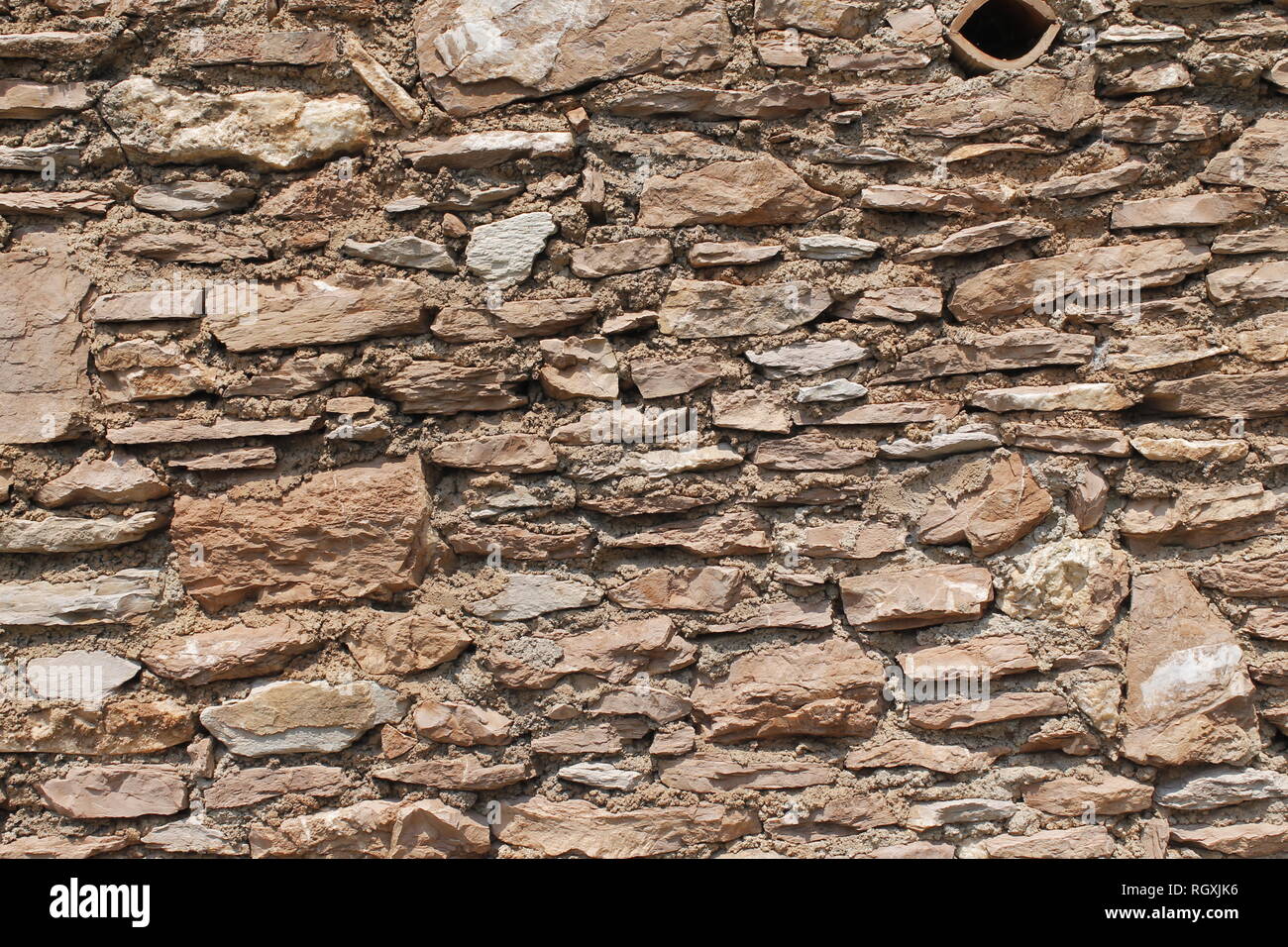 ancient wall with stone bricks. Old building material concept Stock ...