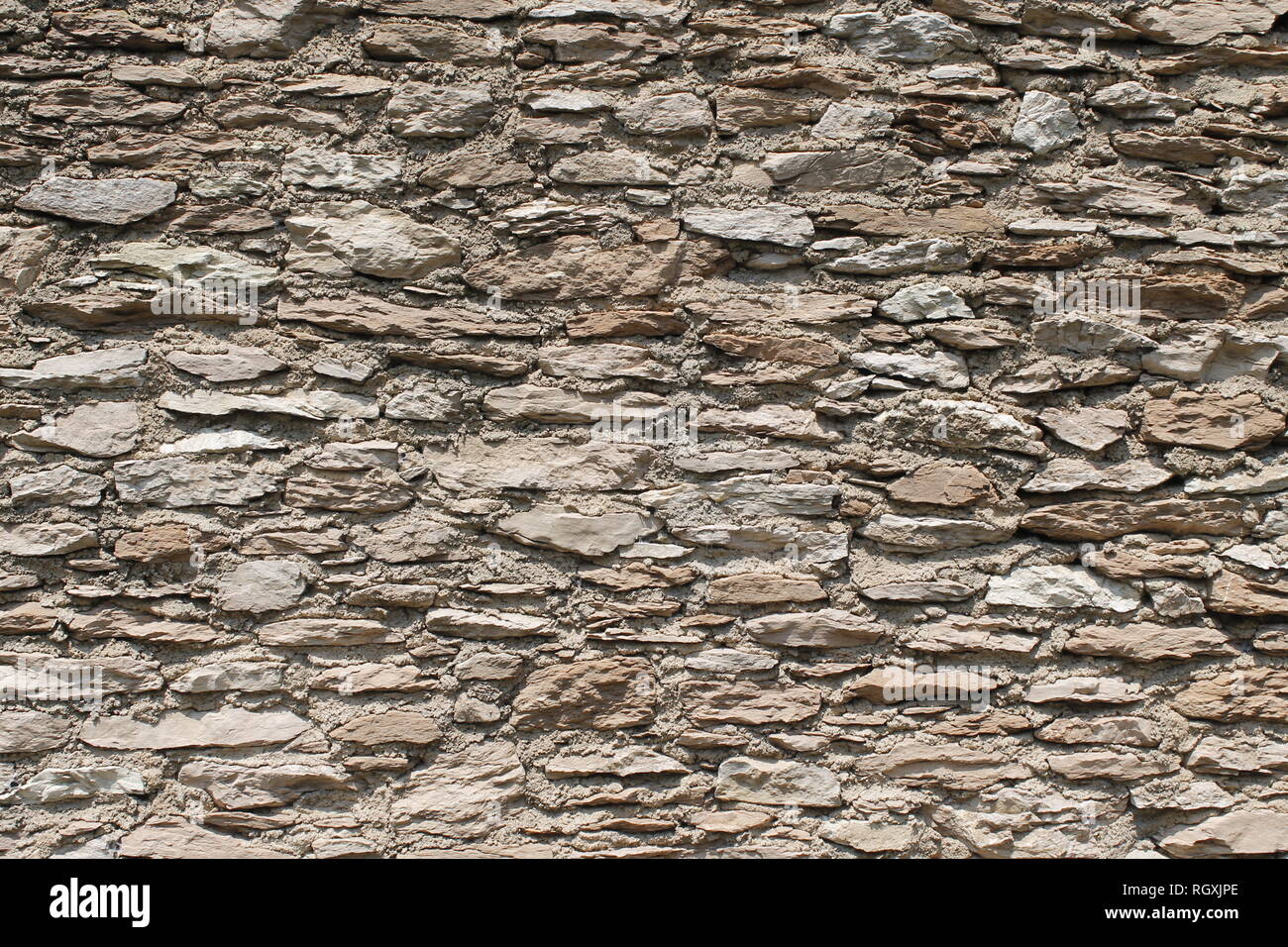 ancient wall with stone bricks. Old building material concept Stock ...