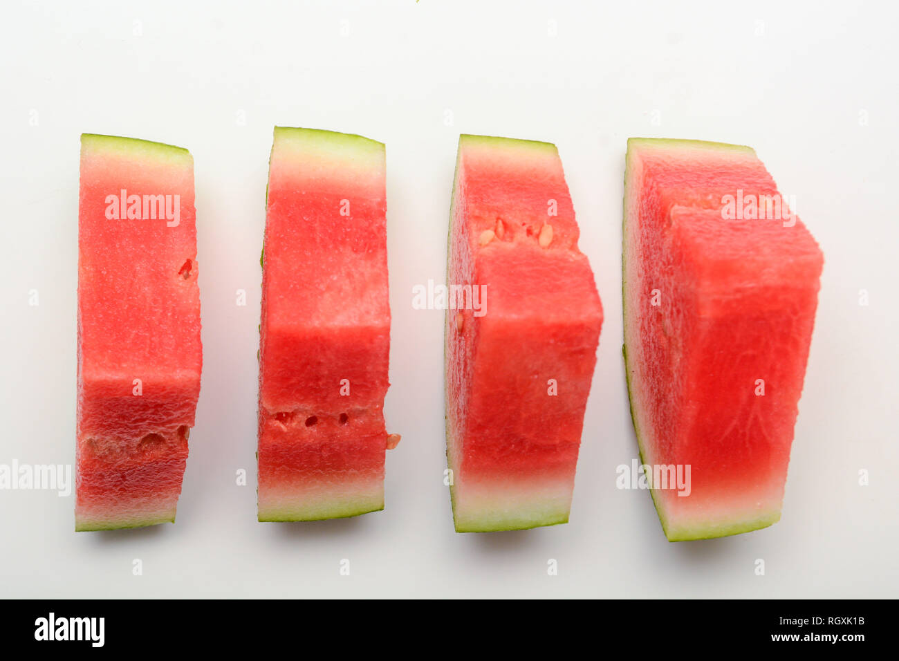 Watermelon isolated on white. Sliced fresh melon peices Stock Photo - Alamy