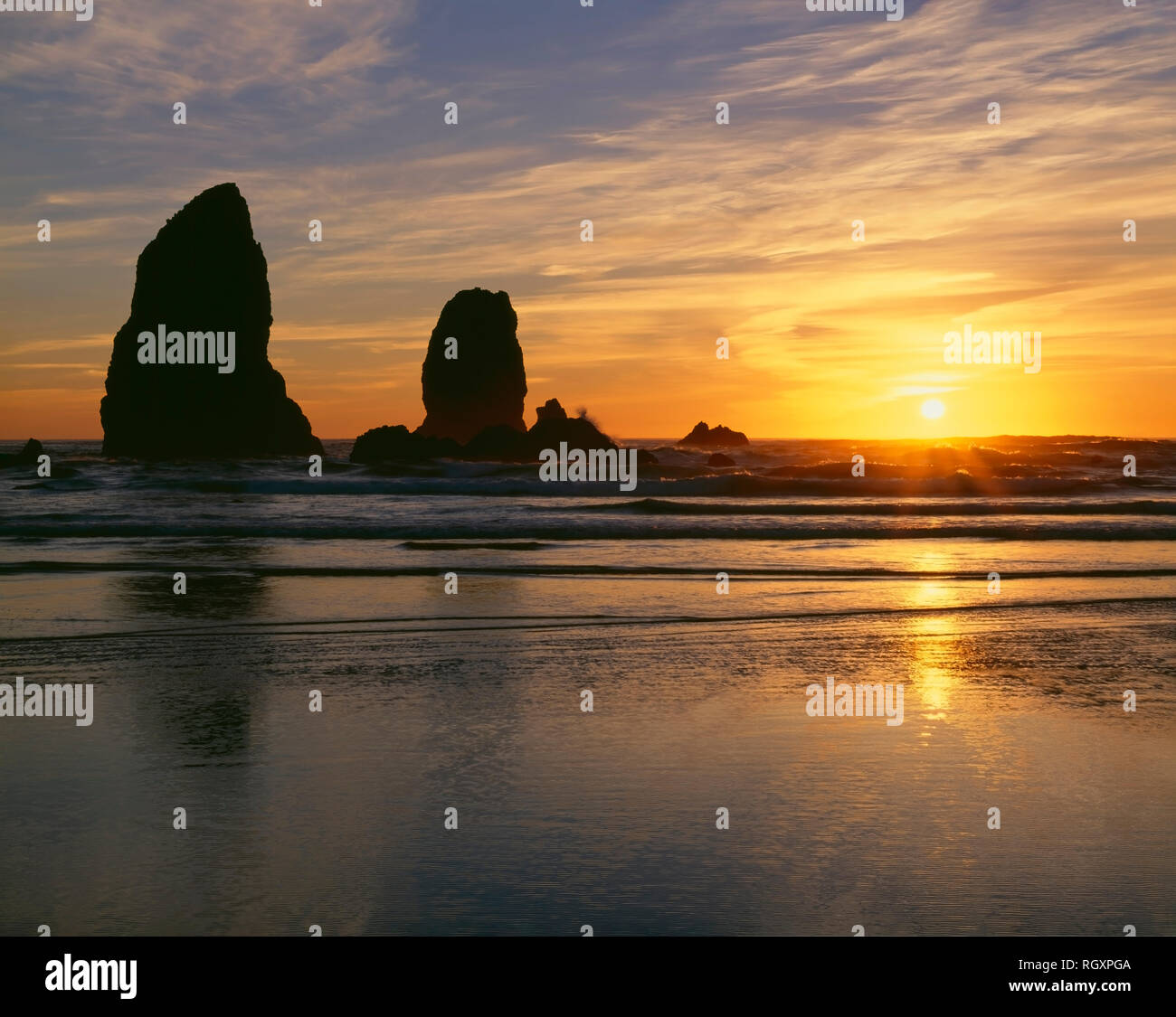 USA, Oregon, Cannon Beach, Sunset and sea stacks called The Needles ...