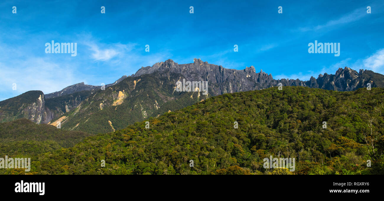 Mount Kinabalu summit and peaks in sunrise light, viewed from Mesilau ...