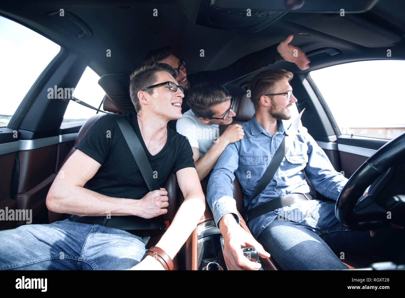 close up. friends talking in the car Stock Photo - Alamy