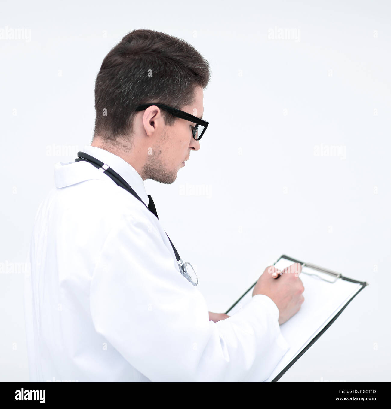 doctor signing the medical report Stock Photo - Alamy