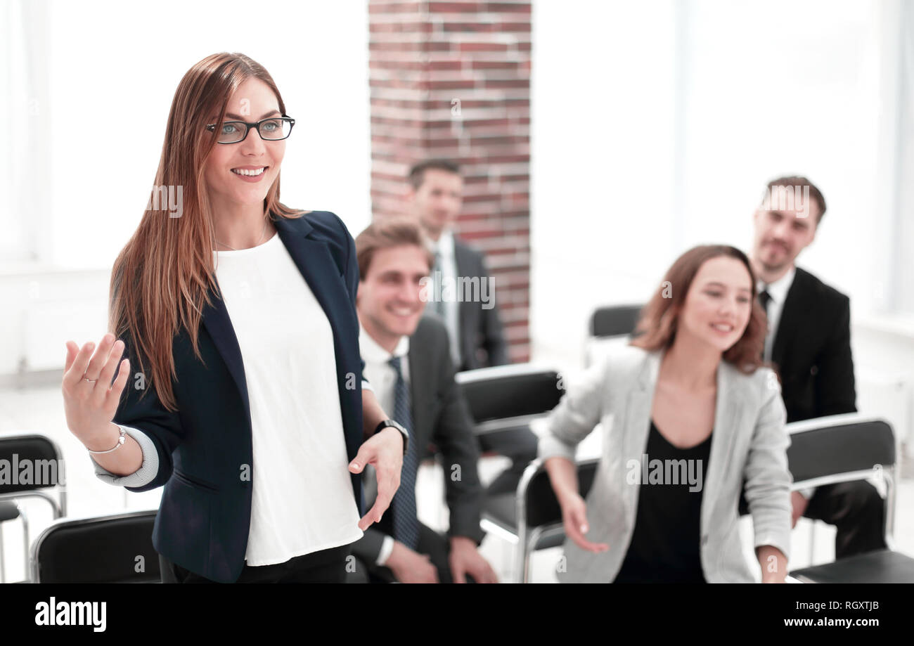 business woman while asking questions during seminar Stock Photo - Alamy