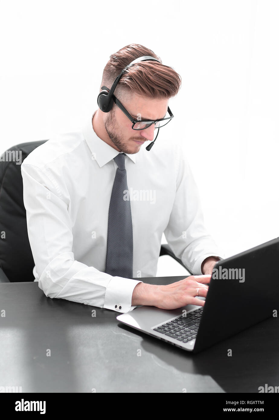 business center employee working on a laptop Stock Photo - Alamy
