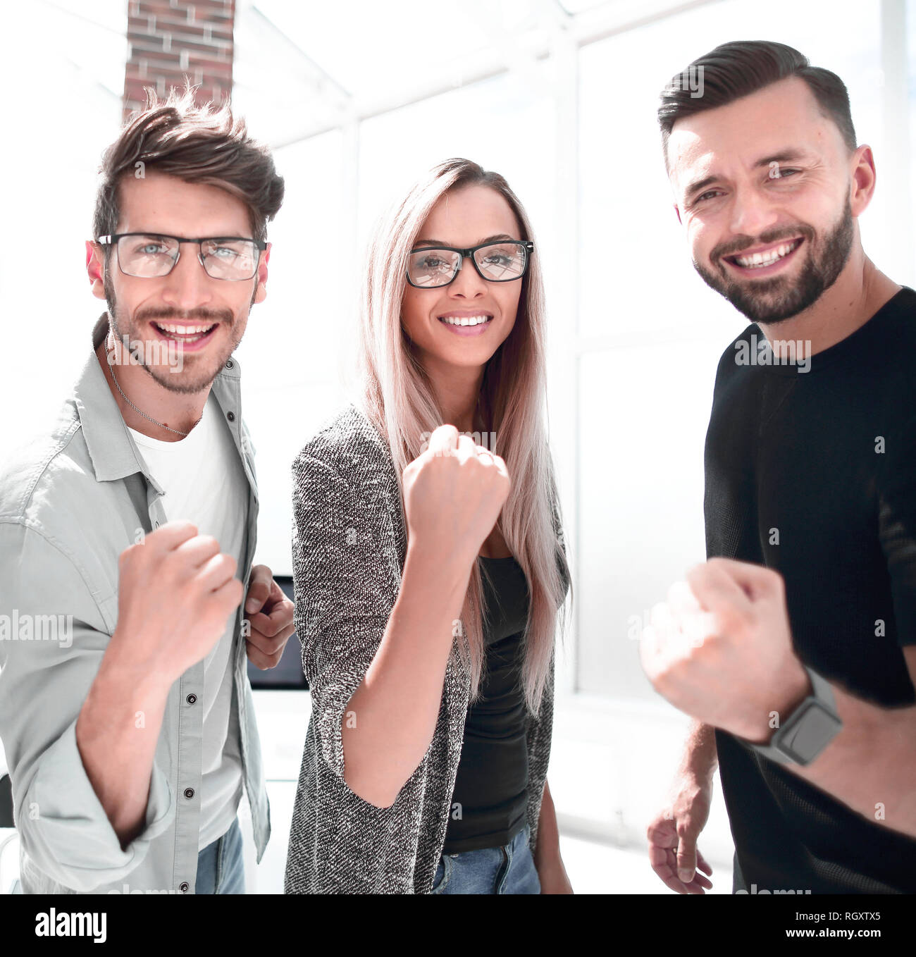 Business team celebrating a good job in the office Stock Photo - Alamy