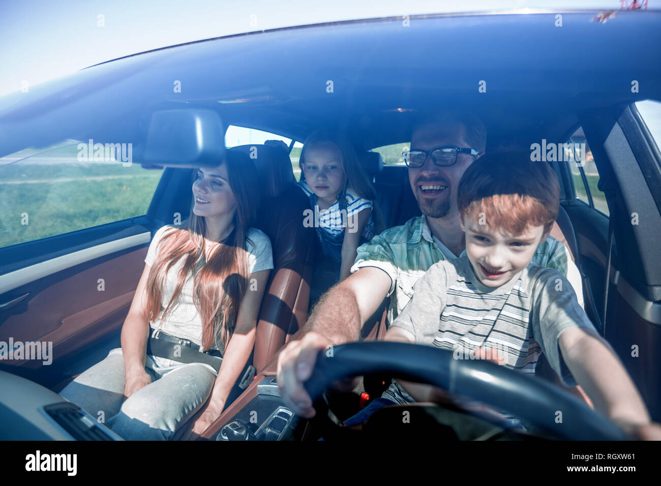 Father Teaching Son To Drive Car High Resolution Stock Photography and ...