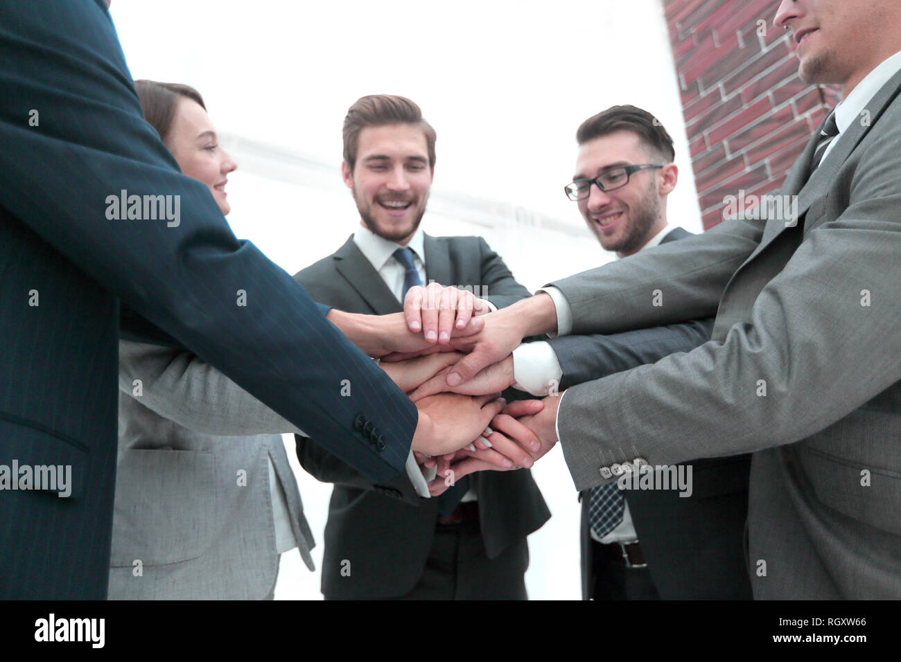 Group of Friends with Hands in Stack, Teamwork Stock Photo - Alamy