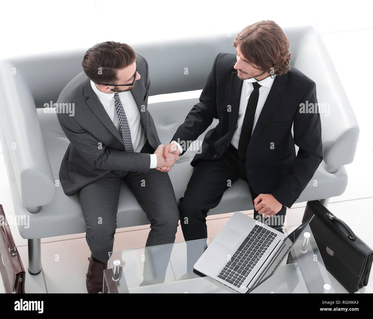 handshake Manager and the client Stock Photo - Alamy