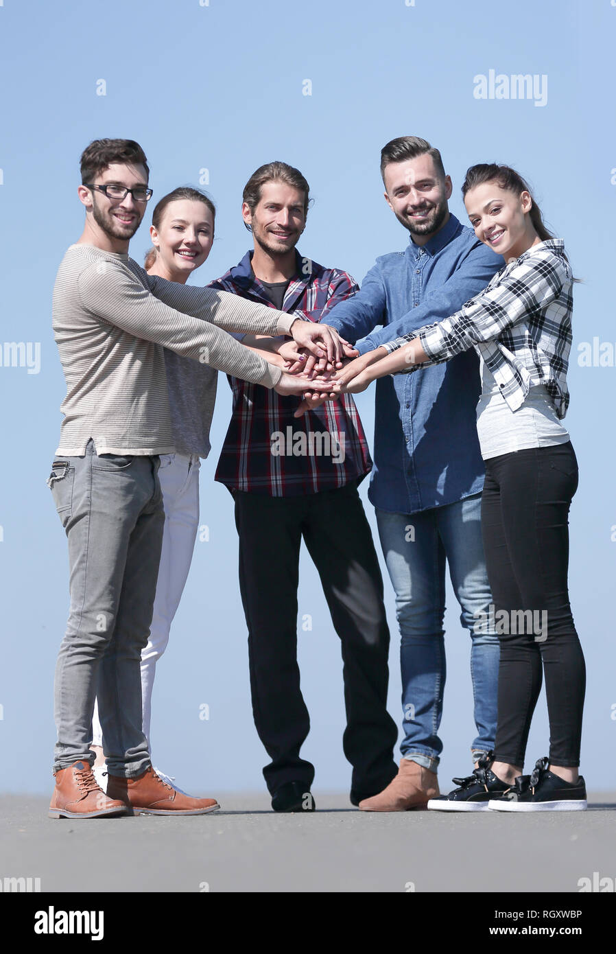 group of young people clasped their hands together Stock Photo - Alamy