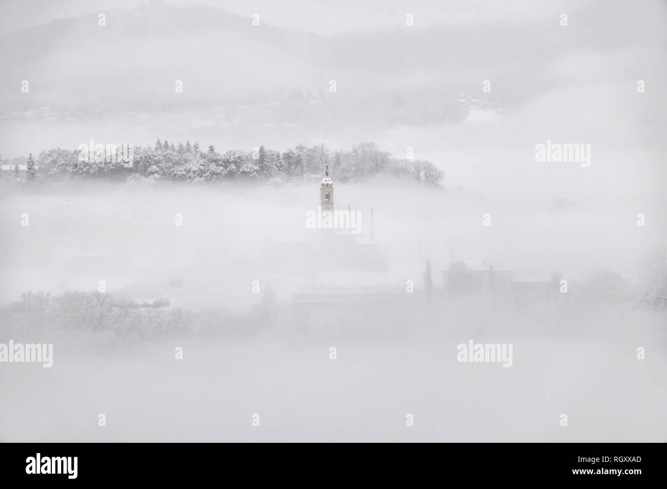 Winter Landscape with Snow and Fog and a Church Tower in Lugano ...