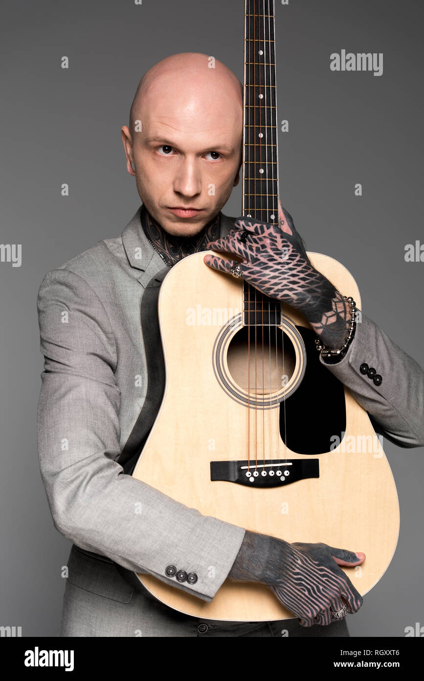 Hugging guitar hi-res stock photography and images - Alamy