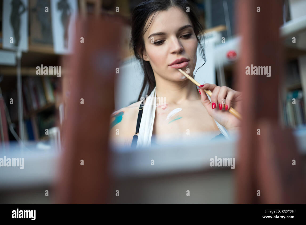 Woman artist painting picture in art studio. Female artist, drawing ...