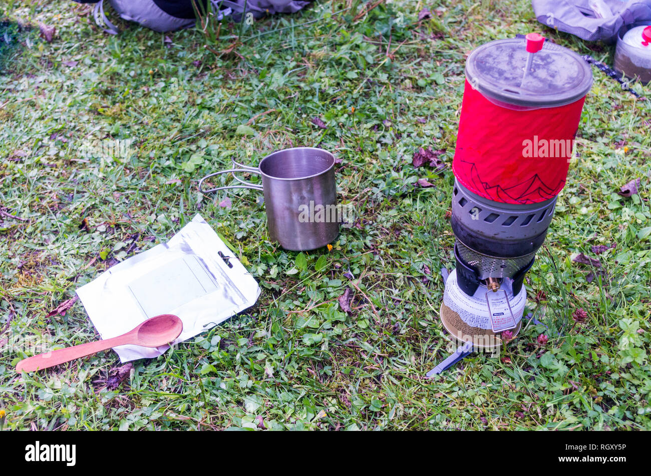 Cook food outdoors in the campaign. Outdoor cooking. Food on the ...