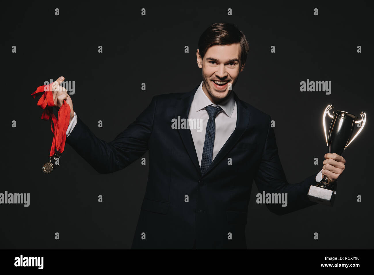 Wearing medals and trophy hi-res stock photography and images - Alamy