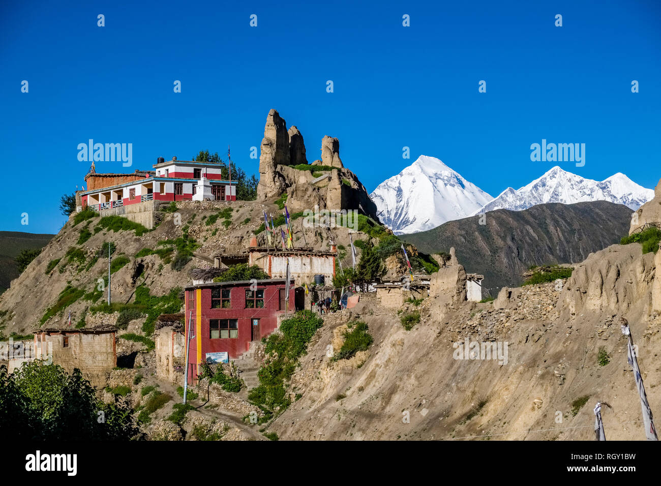 Snow covered mountain range with monastery hi-res stock photography and ...