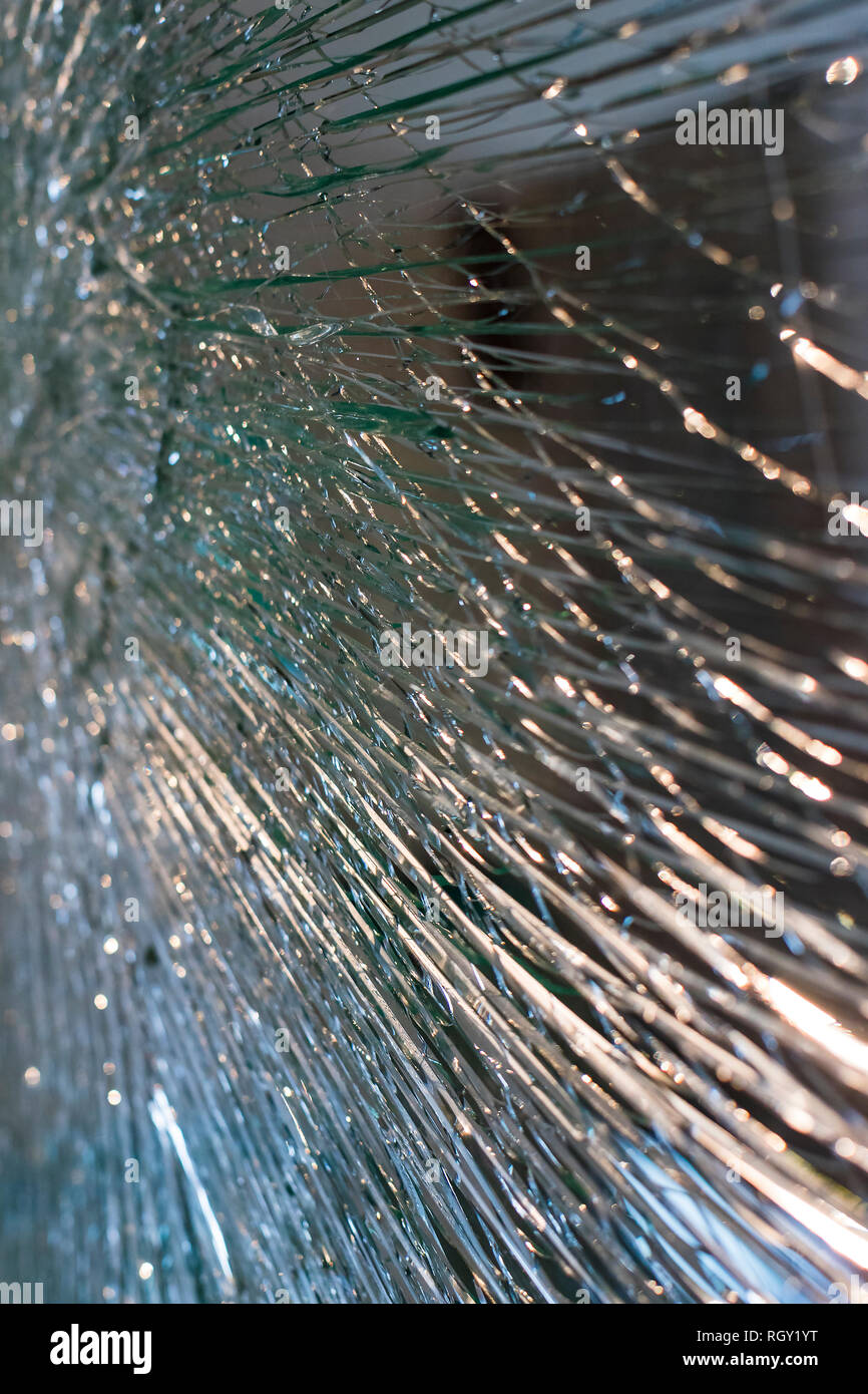 Background of broken transparent window glass close-up Stock Photo - Alamy