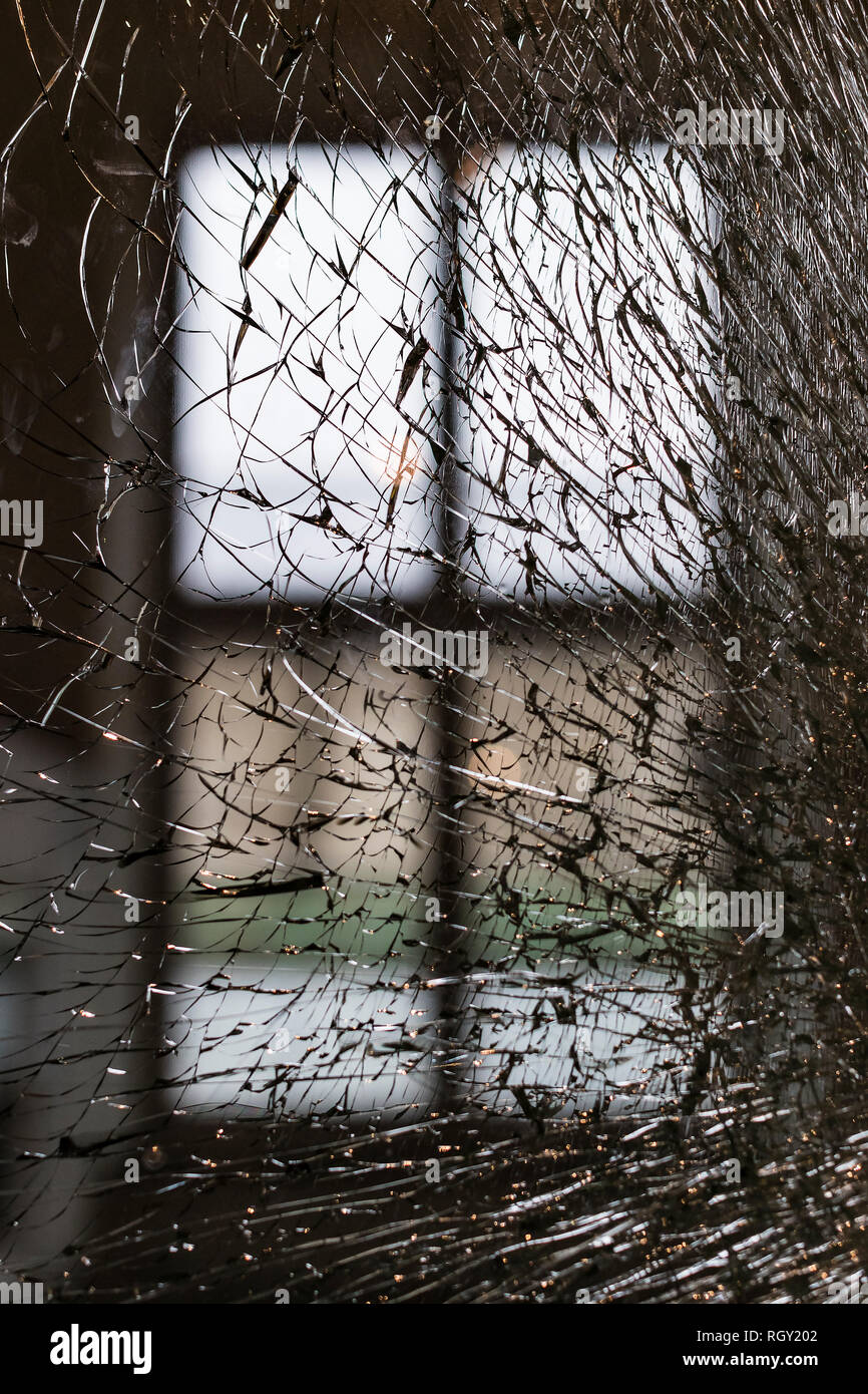 Background of broken transparent window glass close-up Stock Photo - Alamy