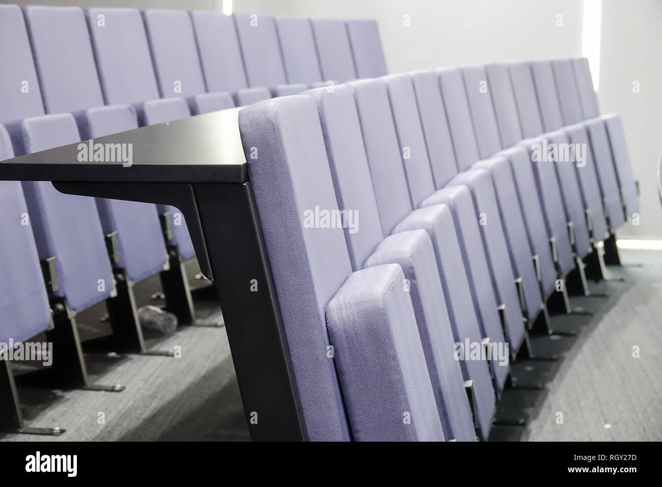 Lecture hall with grey chairs in university Stock Photo - Alamy