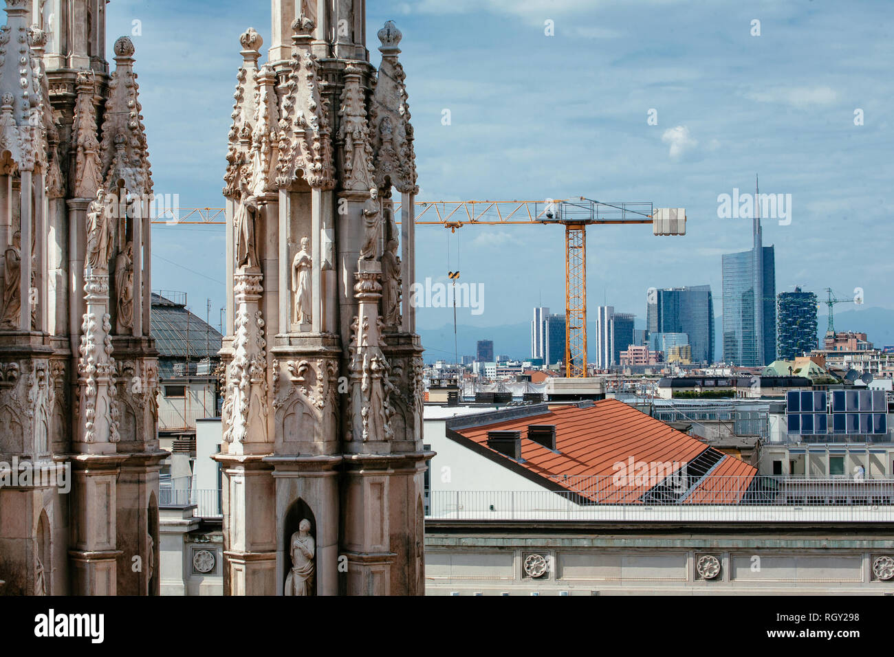 The Modern and the Historic: Porta Nuova and Duomo Spires Stock Photo ...