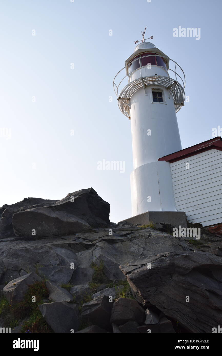 Lighthouse and rocks hi-res stock photography and images - Alamy