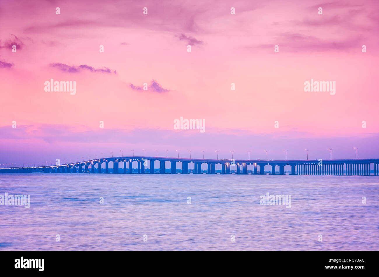 The sun sets on the Bay Saint Louis Bridge, June 15, 2013, in Bay Saint ...
