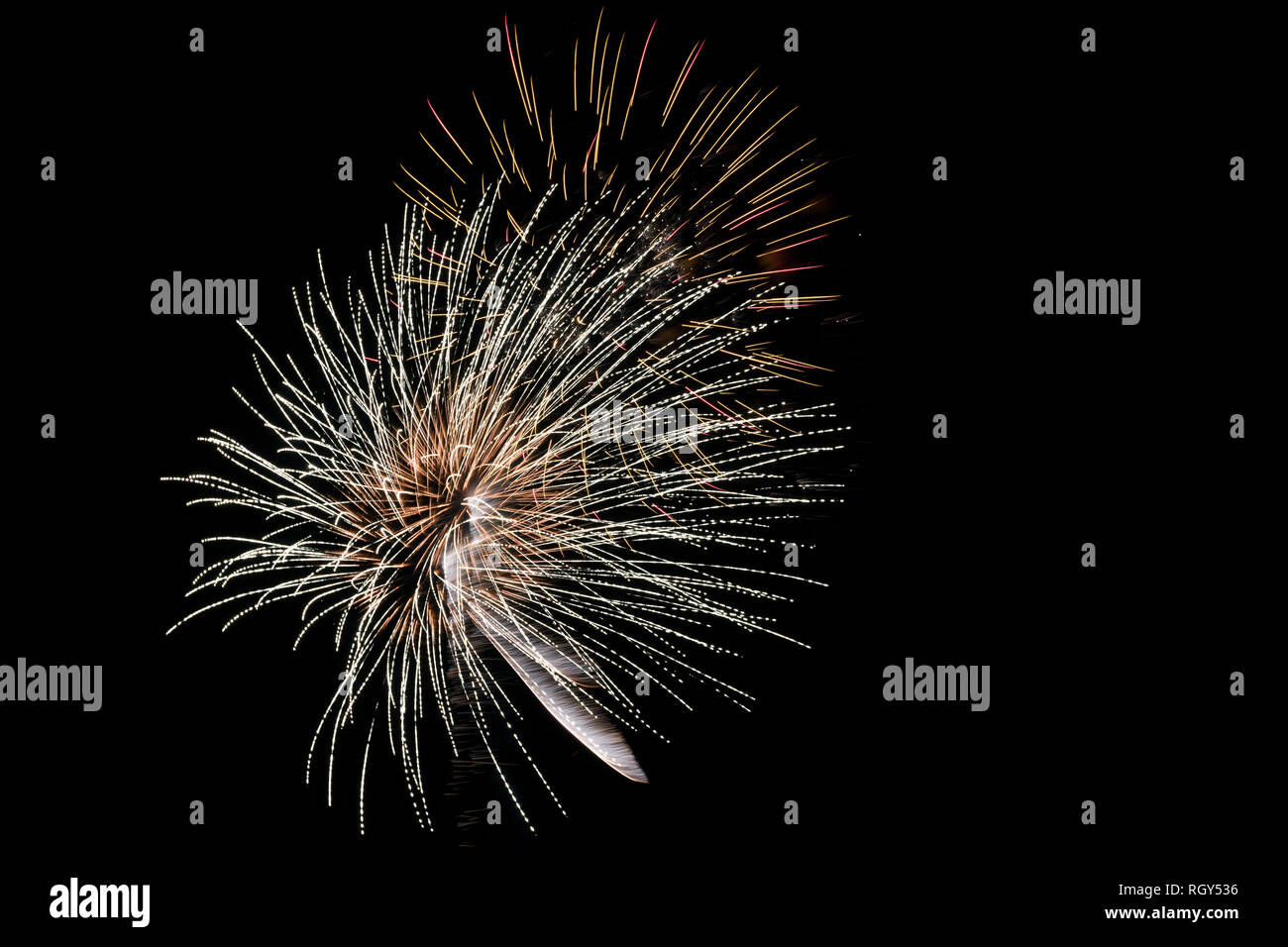 Colorful fireworks of various colors on black background Stock Photo ...