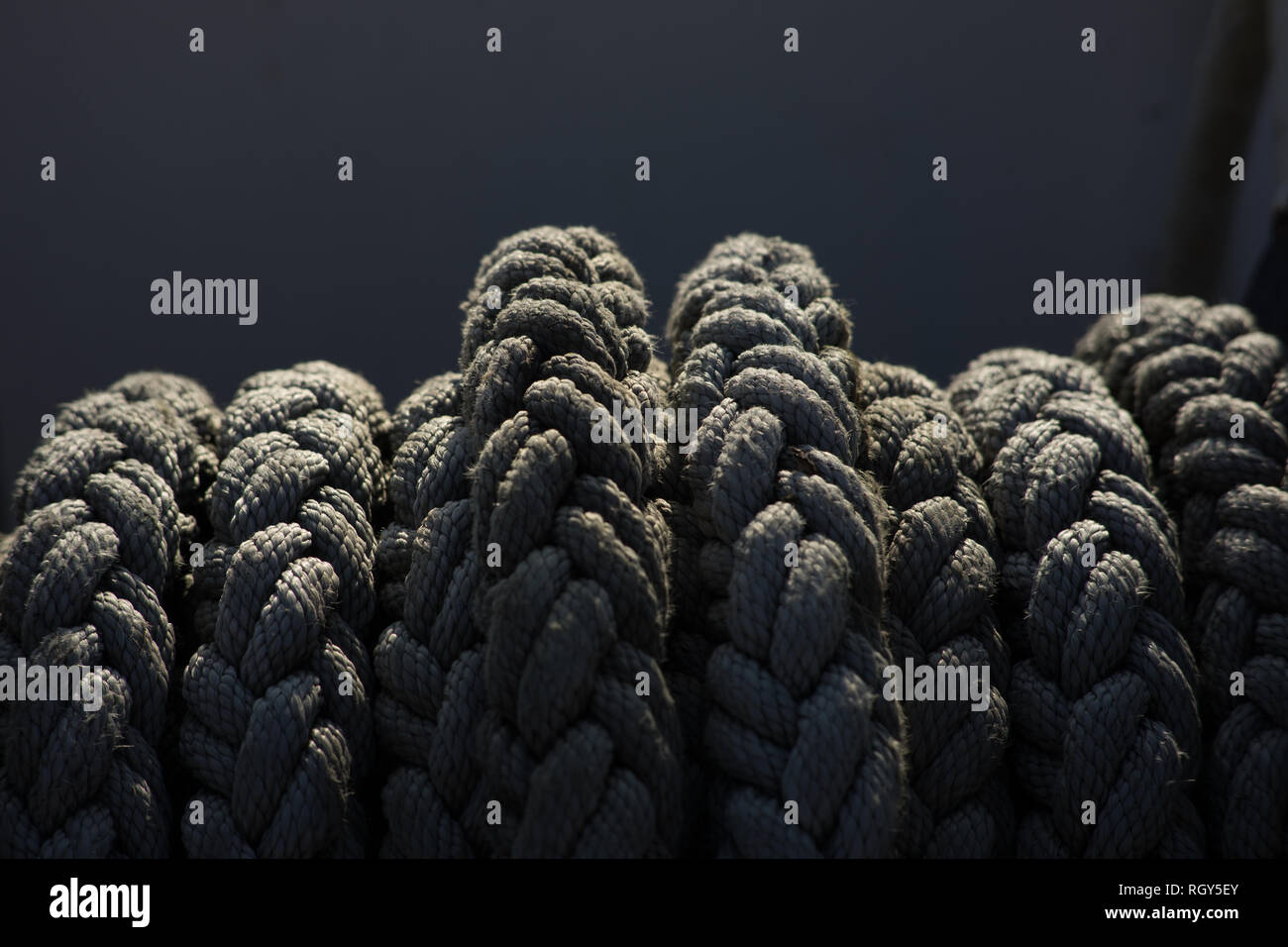 Ship reel with ropes on it in direct sunlight in high contrast Stock ...