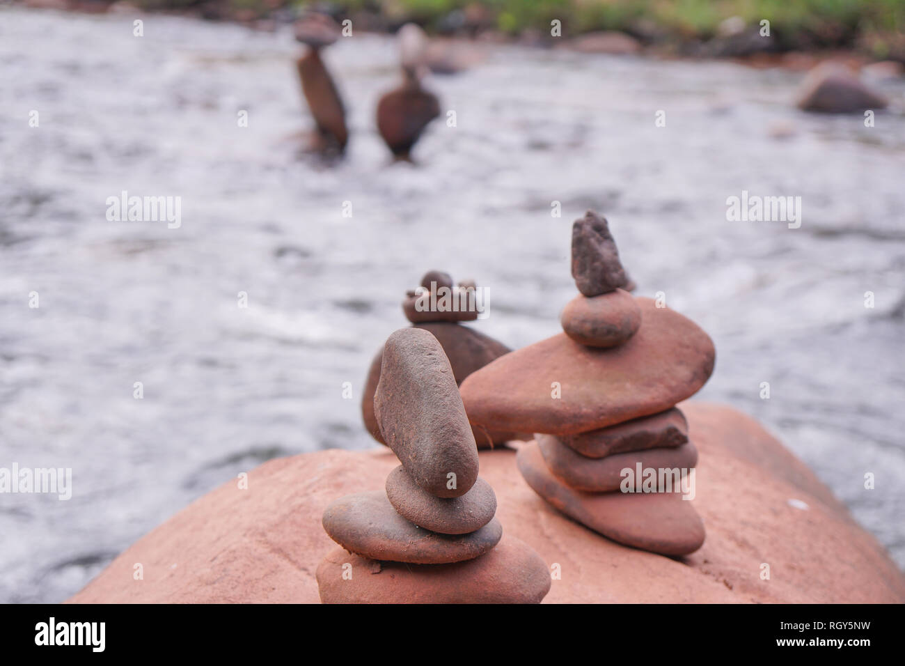 Sort the rocks in the river,wth blur background Stock Photo - Alamy