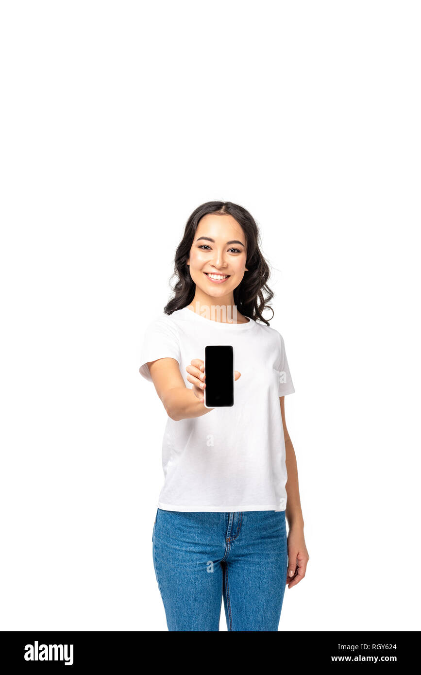 Beautiful young asian girl showing smartphone with blank screen ...