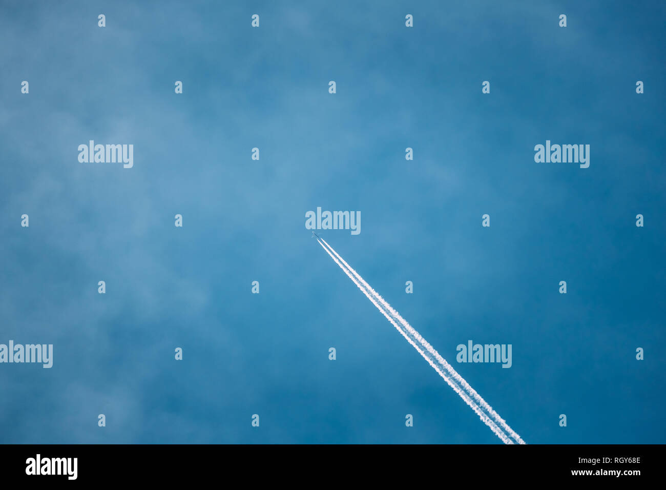 Contrail In Blue Sky. Plane In Sunny Sky Background. Airplane Aircraft ...