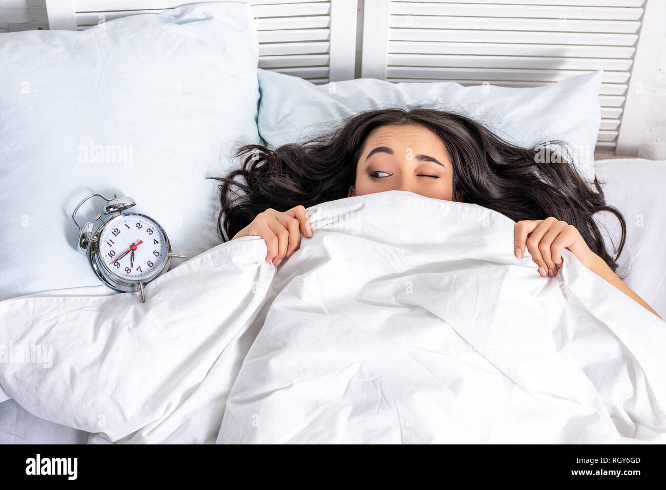 Squinting one eye hi-res stock photography and images - Alamy