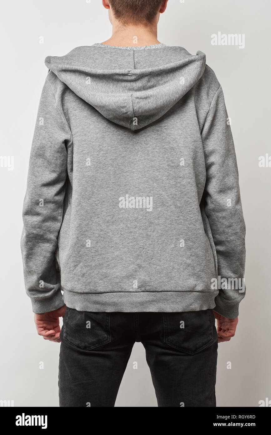 back view of man in grey hoodie with copy space isolated on white Stock ...