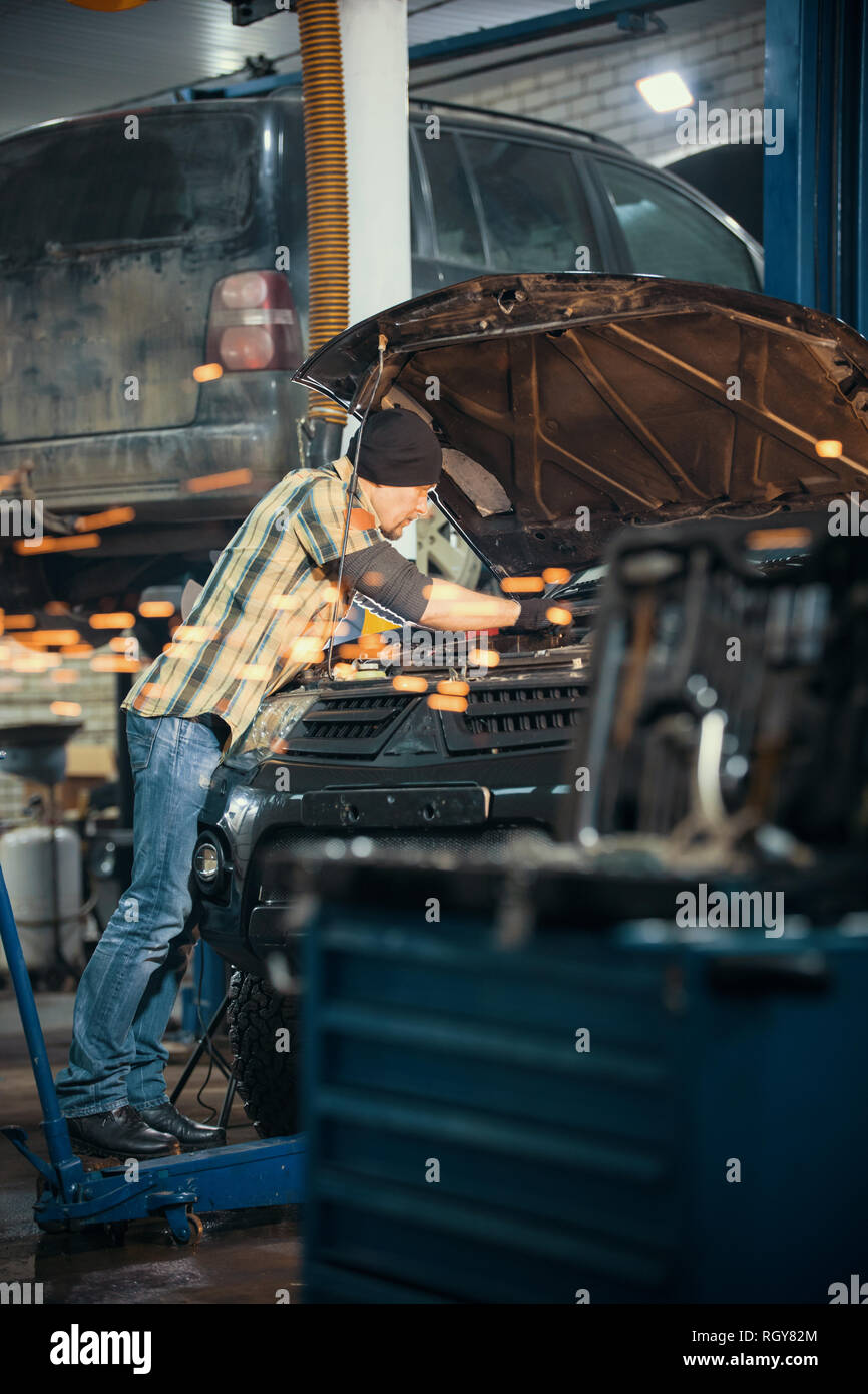 Hand adjusting fire hi-res stock photography and images - Alamy