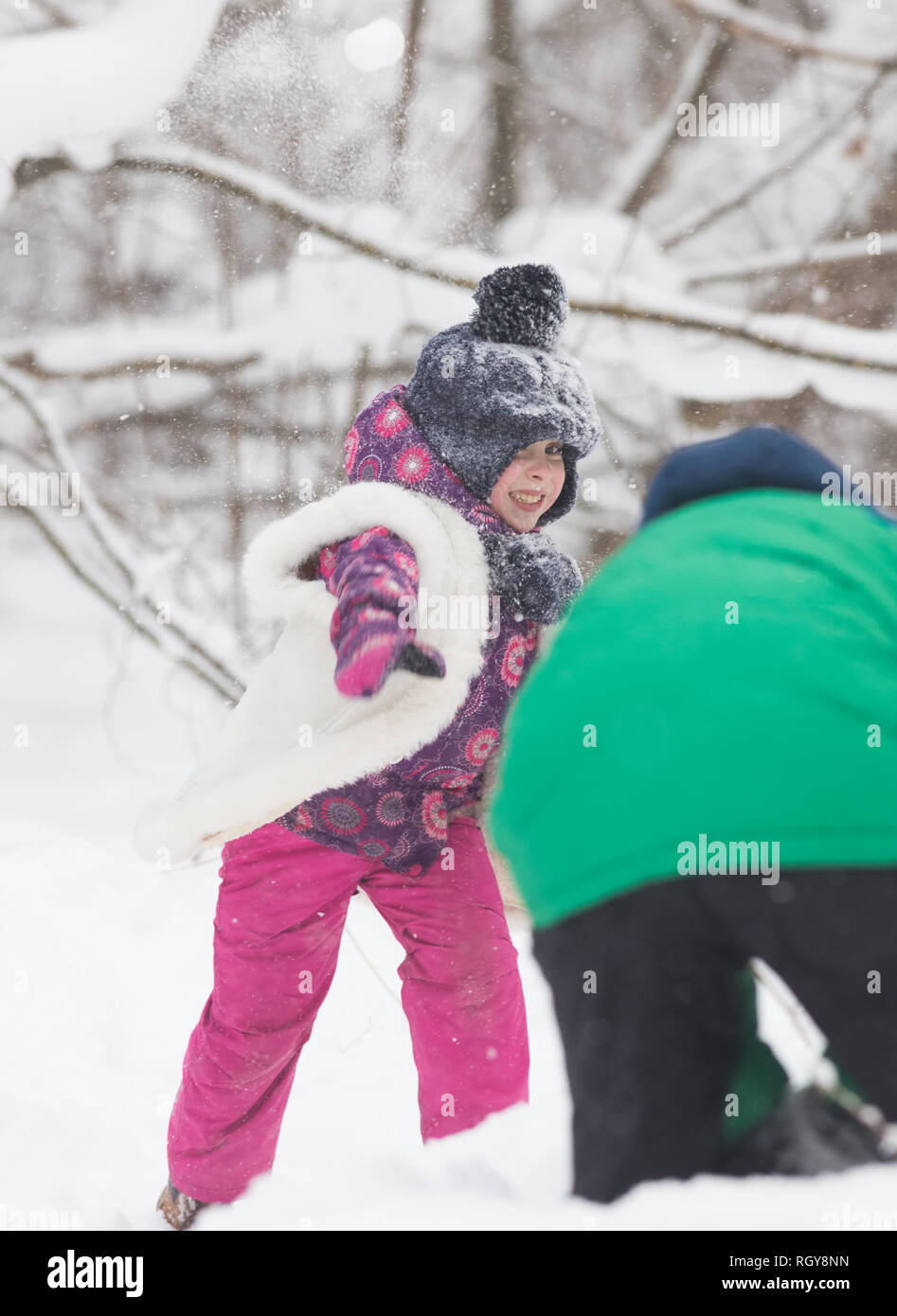 Children Throwing Snowballs High Resolution Stock Photography and ...